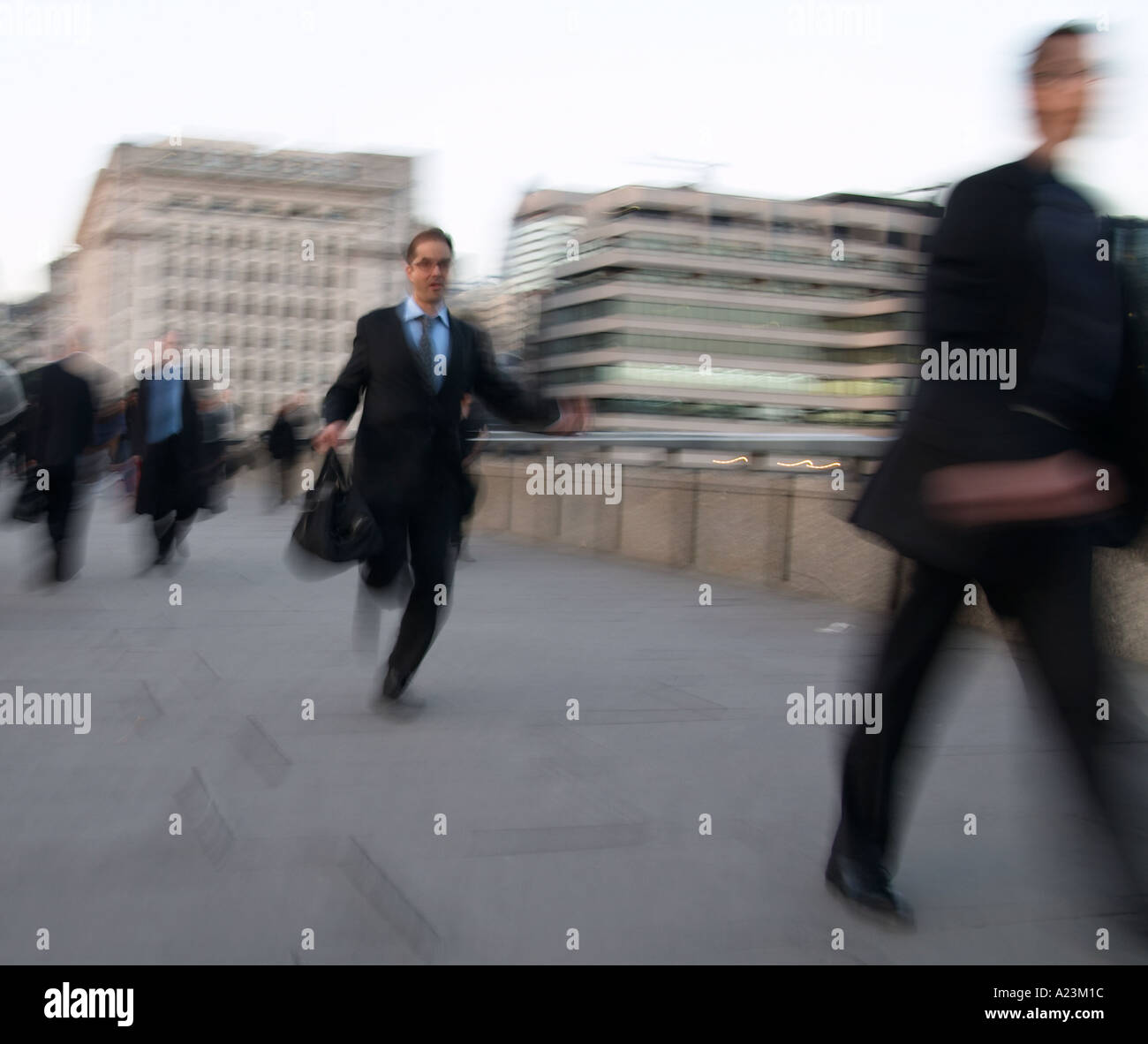 man running rushing to work across London Bridge in UK Stock Photo - Alamy