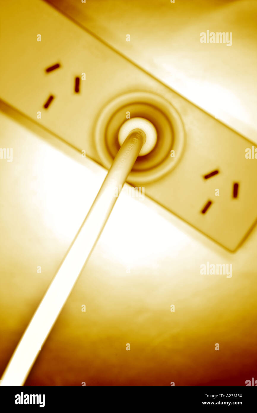 Electrical plug in powerboard Stock Photo - Alamy