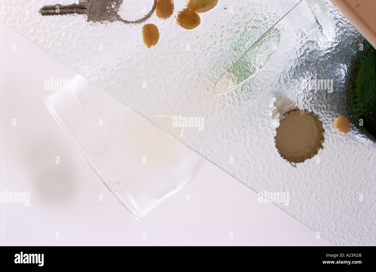 overturned beer glass keys peanuts car keys Stock Photo - Alamy
