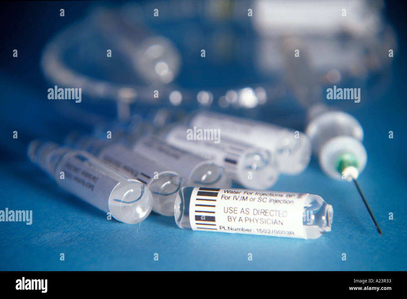 Water capsules and needle Stock Photo - Alamy