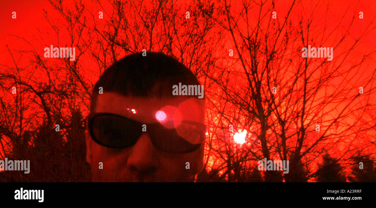 red weird man male sunlight alien sinister trees branches crimson ...