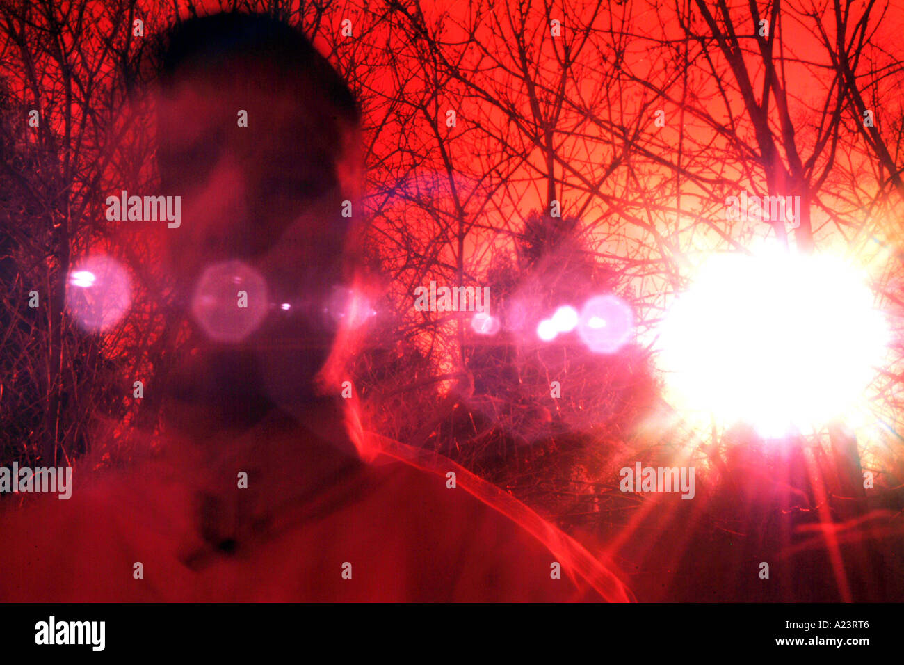 red weird man male sunlight alien sinister trees branches crimson ...