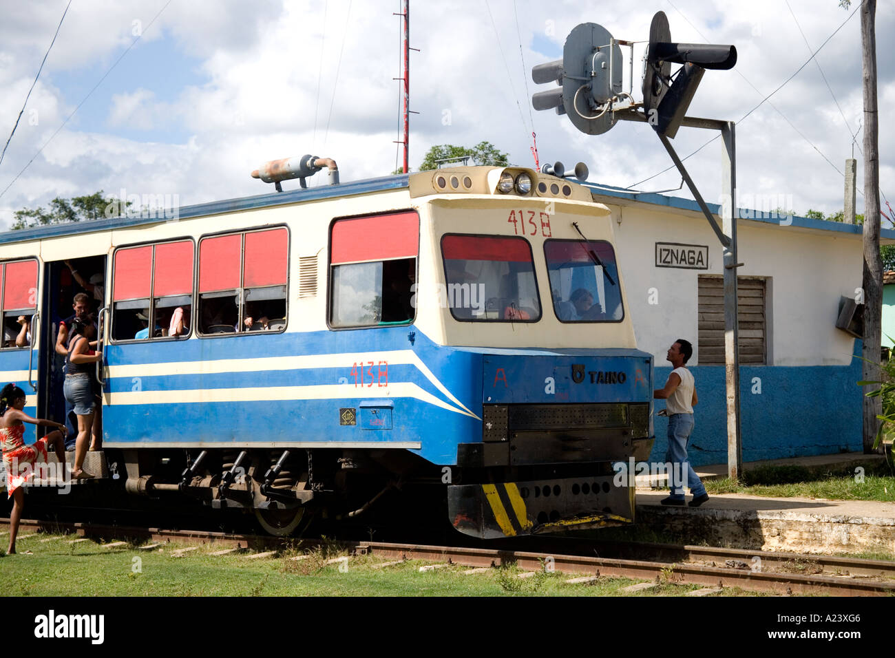 Train stopping at Iznaga station by the old colonial sugar plantation ...