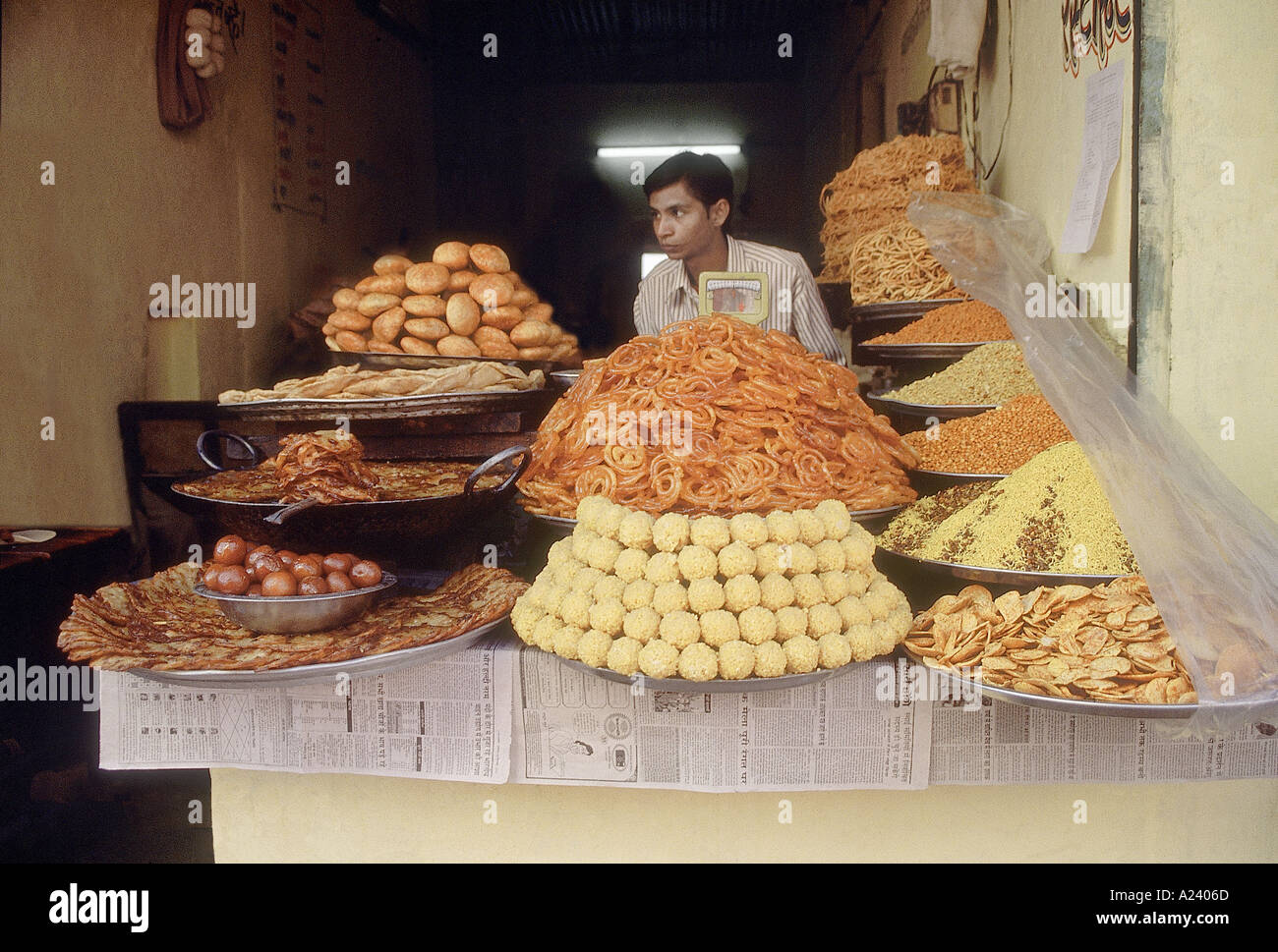 A shopkeeper selling grams and sweets. Pushkar, Ajmer, Rajasthan, India ...