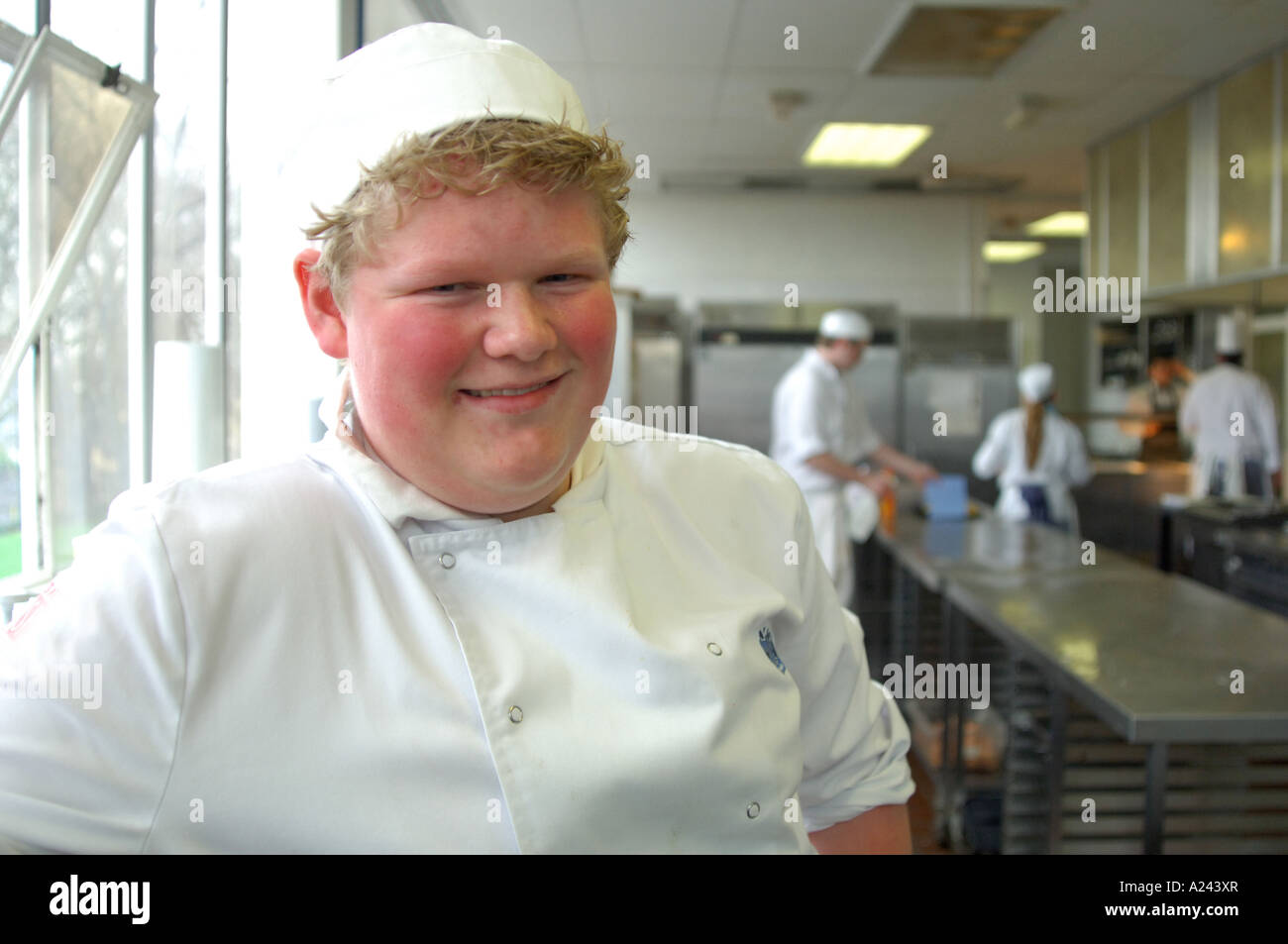 British young male student chef UK portrait Stock Photo - Alamy