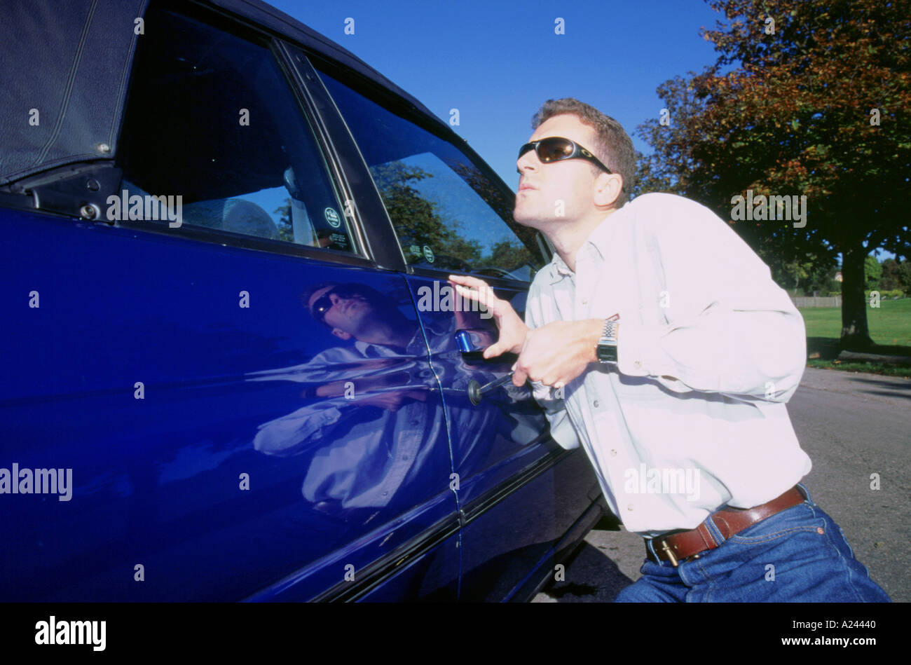 Man breaking in hi-res stock photography and images - Alamy