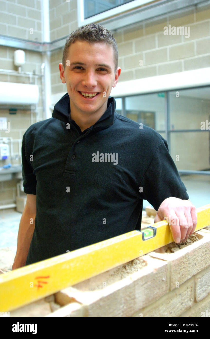 British young student smiling happy bricklayer portrait UK Stock Photo ...