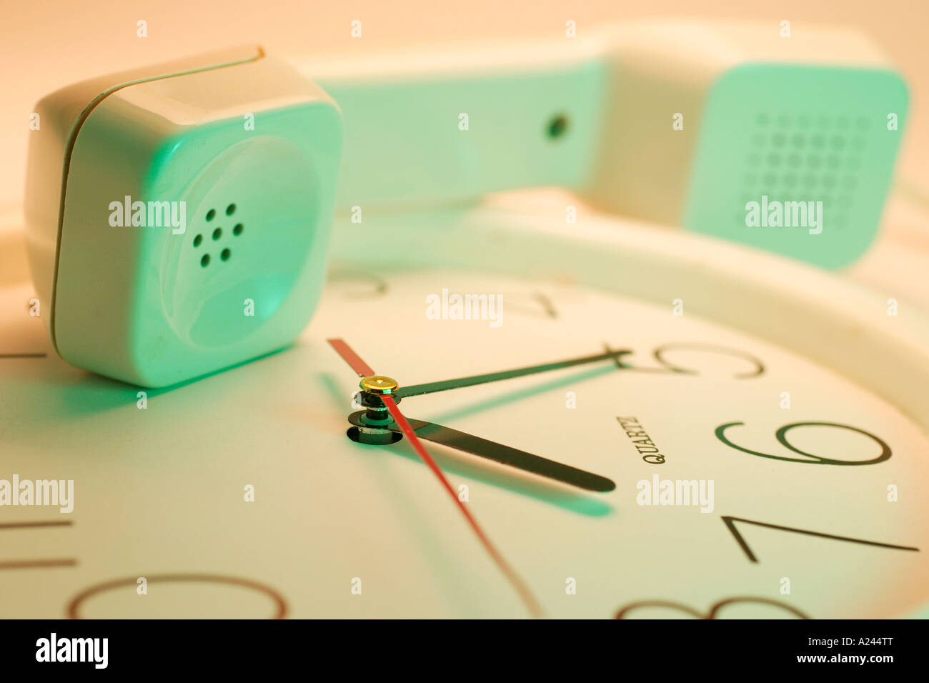Phone Receiver on Clock Stock Photo - Alamy
