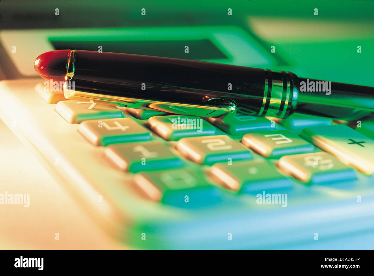 Calculation calculator ball pen hi-res stock photography and images - Alamy