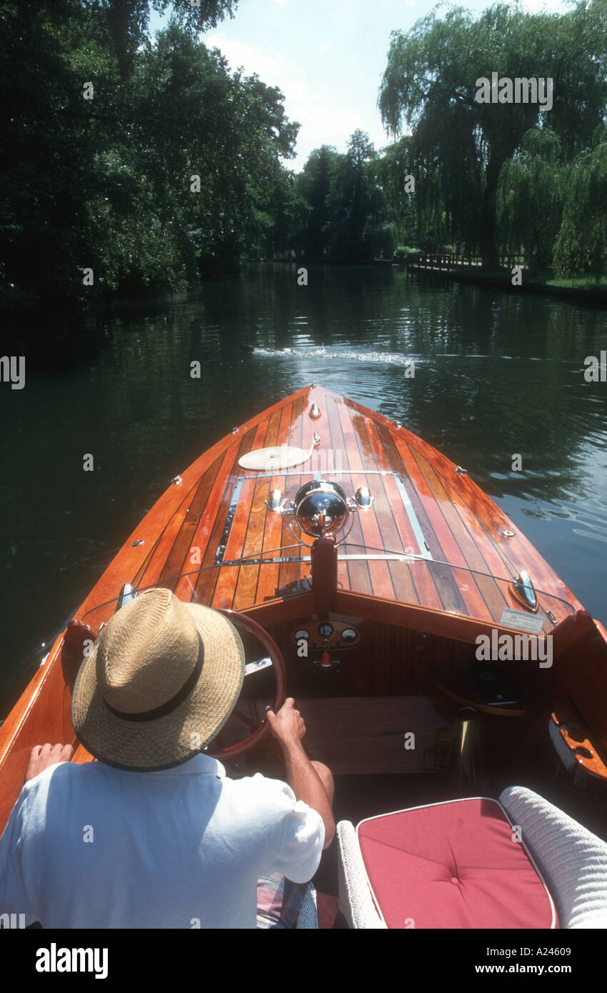A young man in an electric powered slipper launch River Thames Henley ...