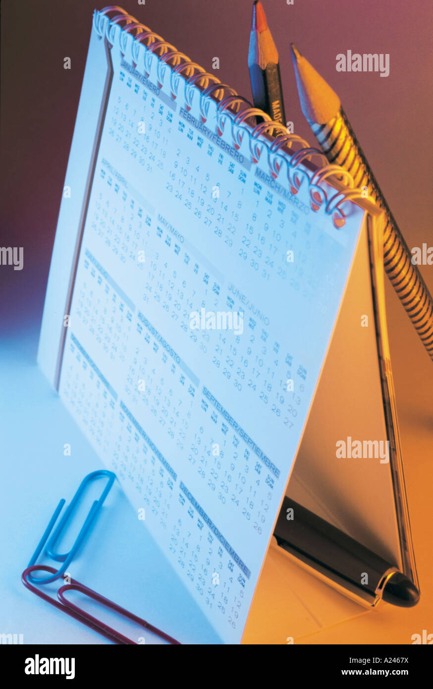 Desk Calendar and Paperclips Stock Photo - Alamy