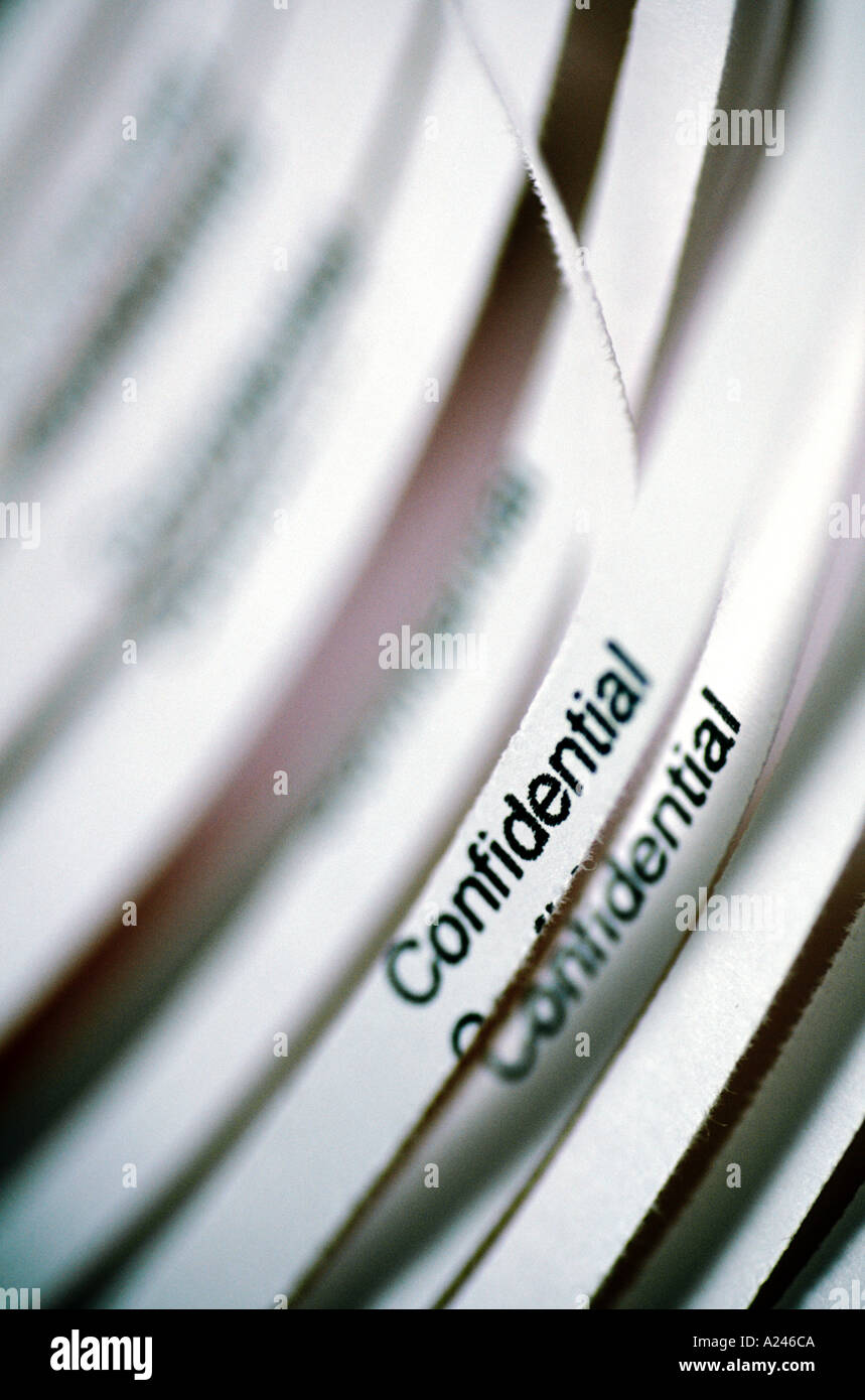 Confidential paper document shredder Stock Photo - Alamy