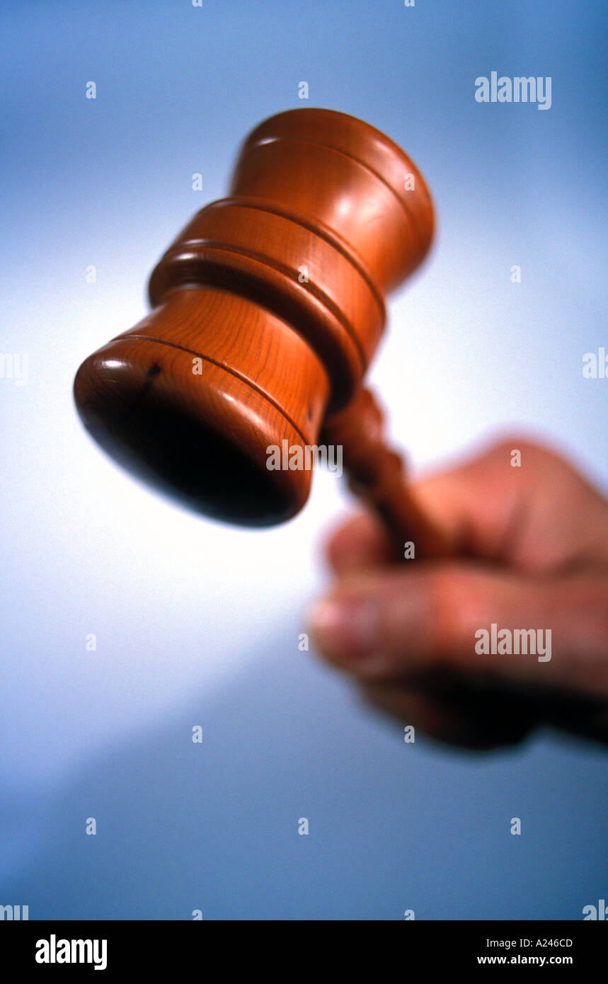 Gavel in hand Stock Photo - Alamy
