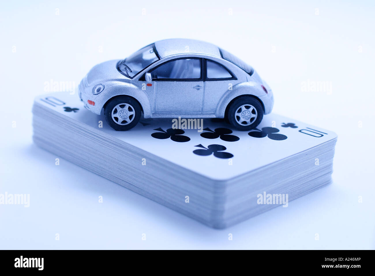 Toy Car on Stack of Playing Cards Stock Photo - Alamy
