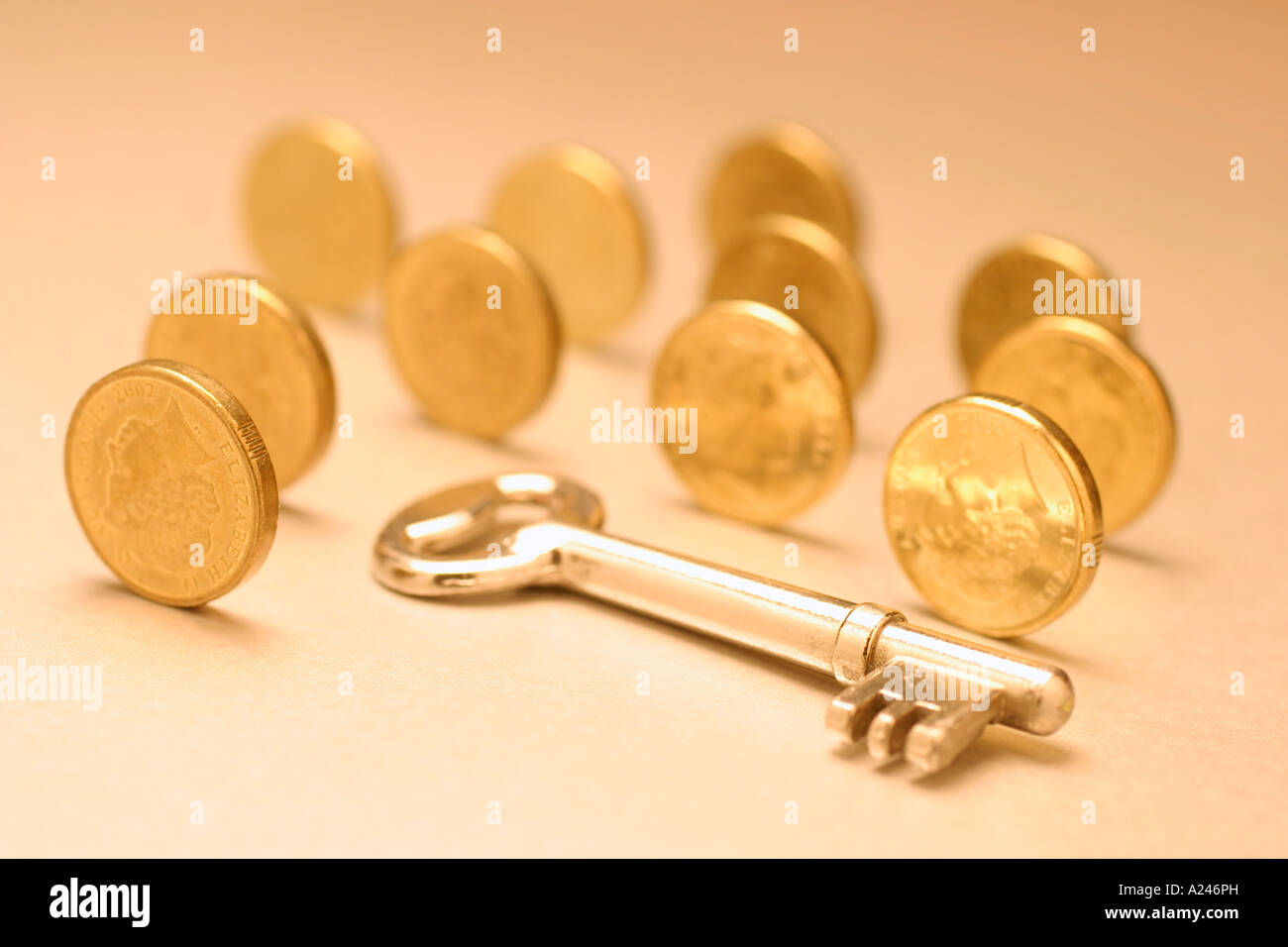Coins and Skeleton Key Stock Photo - Alamy