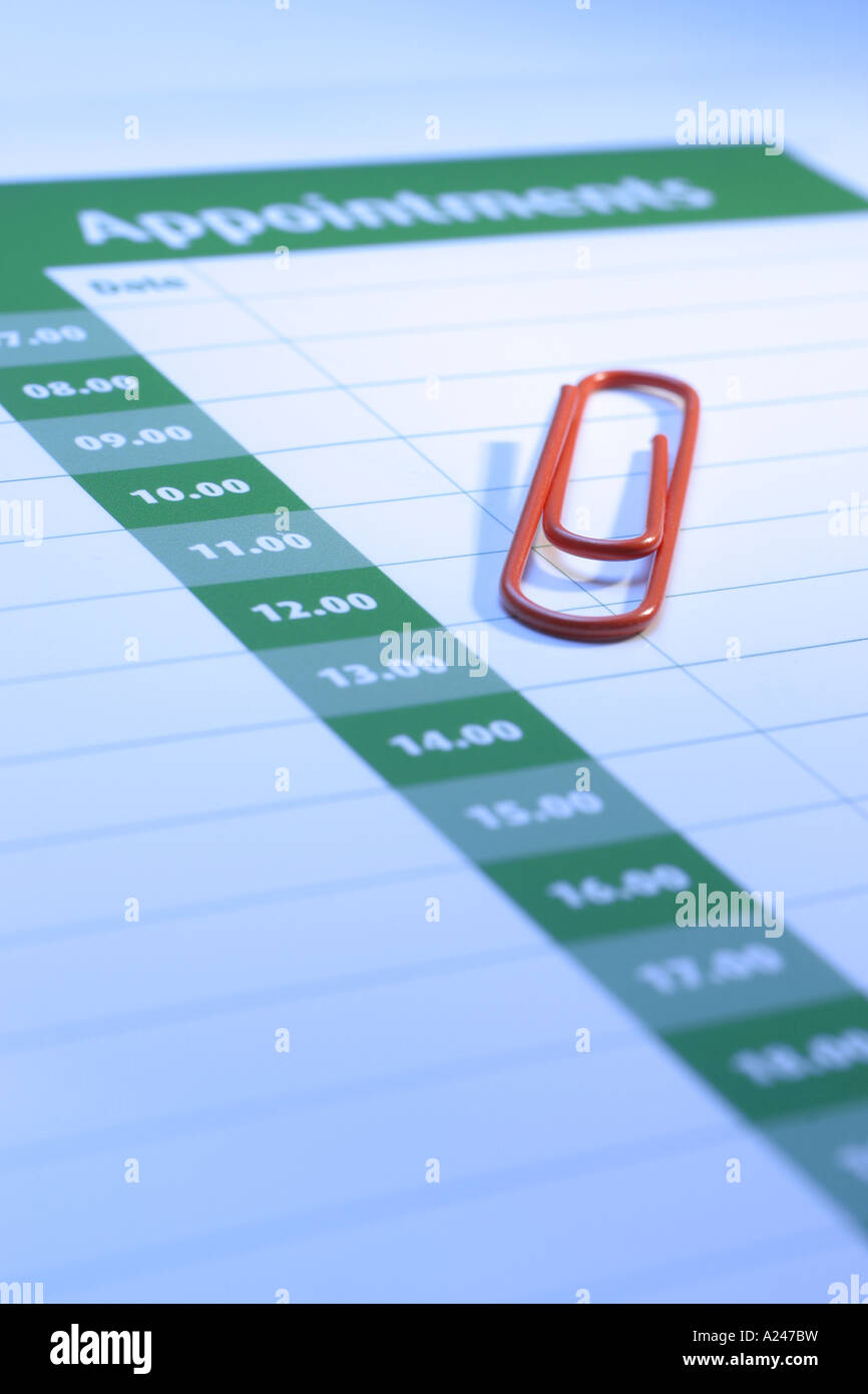 Paperclip on Calendar Stock Photo - Alamy