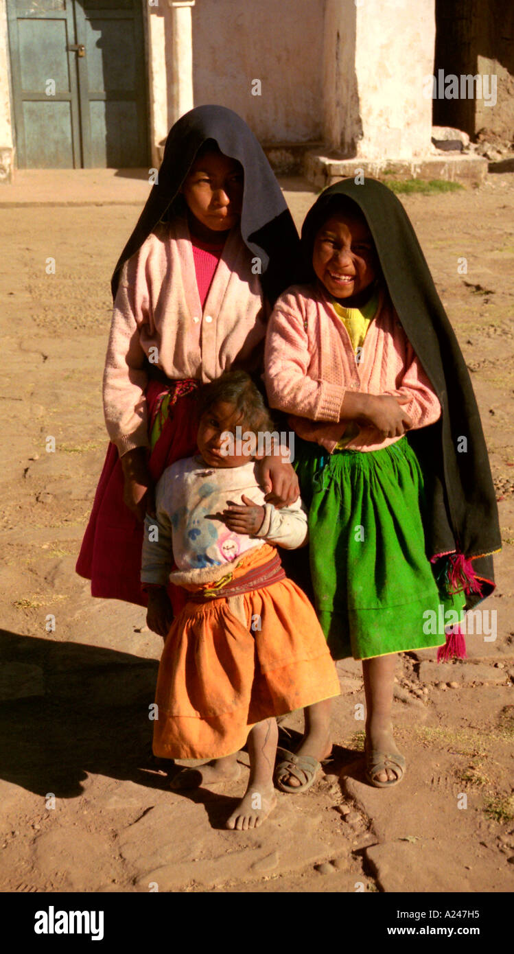 Three little Peruvian girls, Isla Taquille, Lake Titicaca, Peru Stock ...