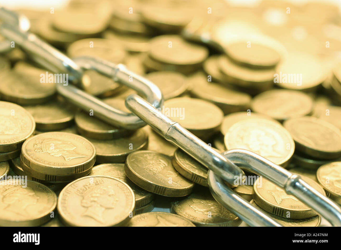 Chain and Coins Stock Photo - Alamy