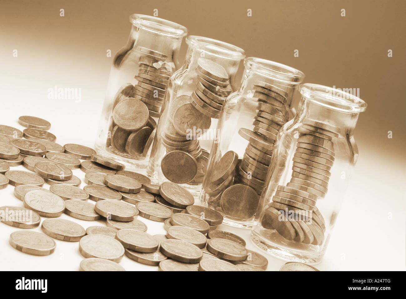 Glass Bottles and Coins Stock Photo - Alamy
