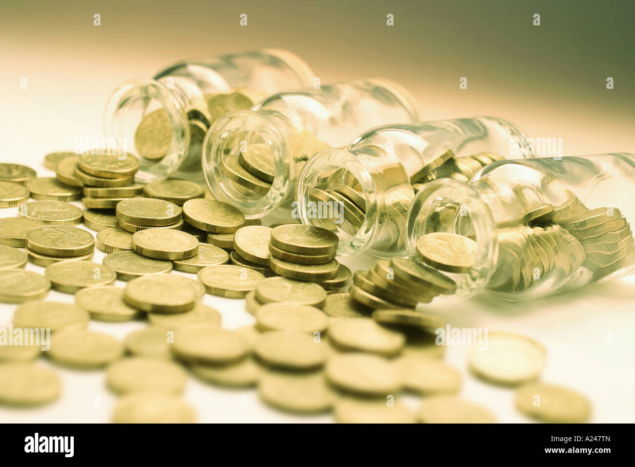 Glass Bottles and Coins Stock Photo - Alamy