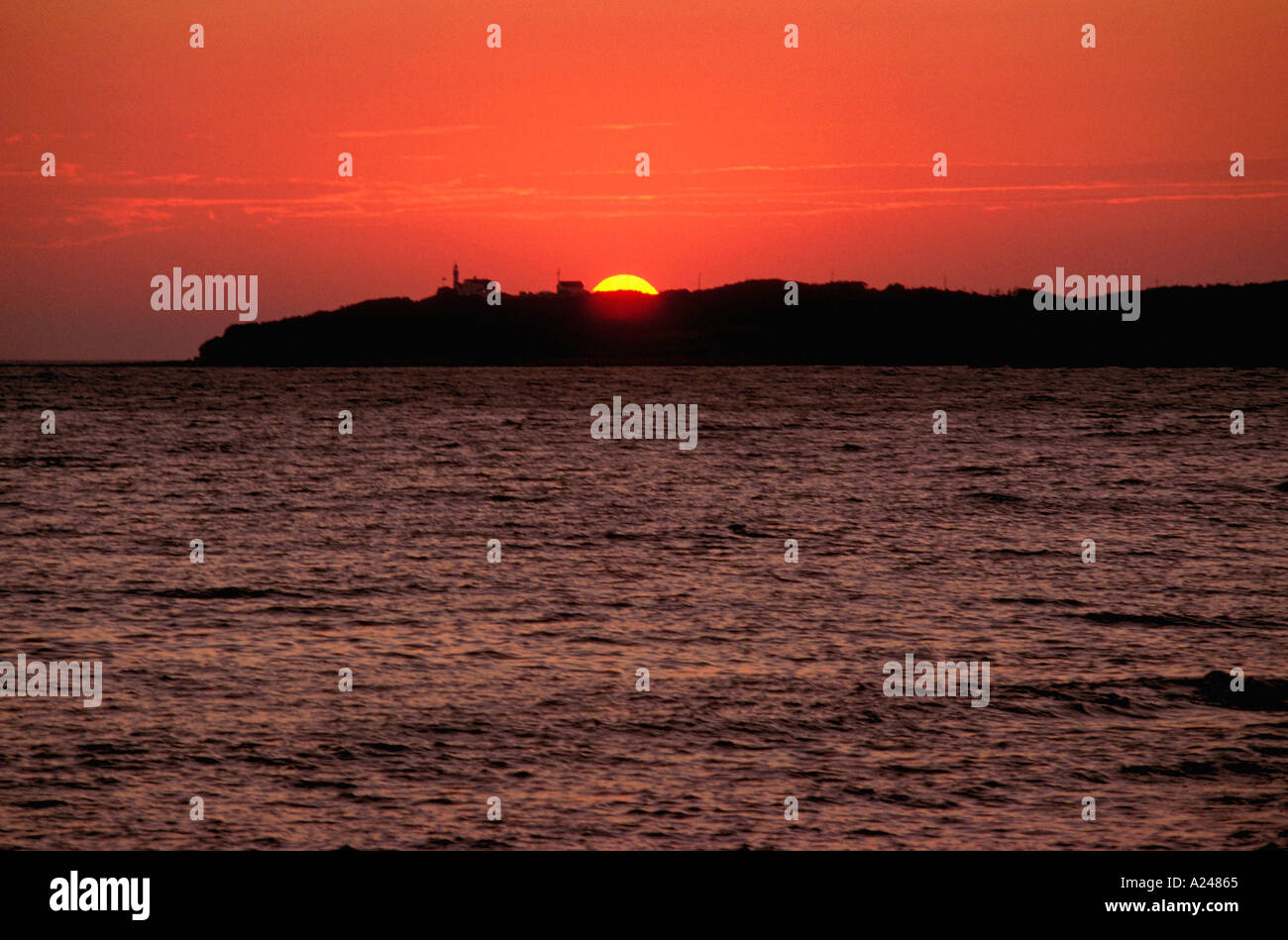 Red sunset over ocean many more images available of colourful sunrises ...