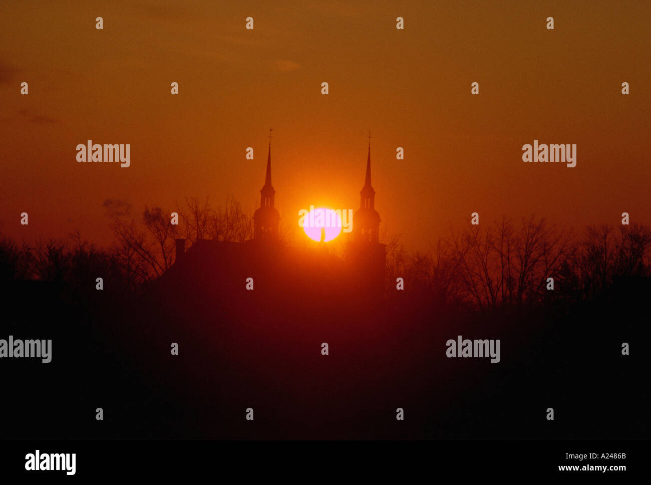 Sunrise over church steeples many more images available of Christian ...
