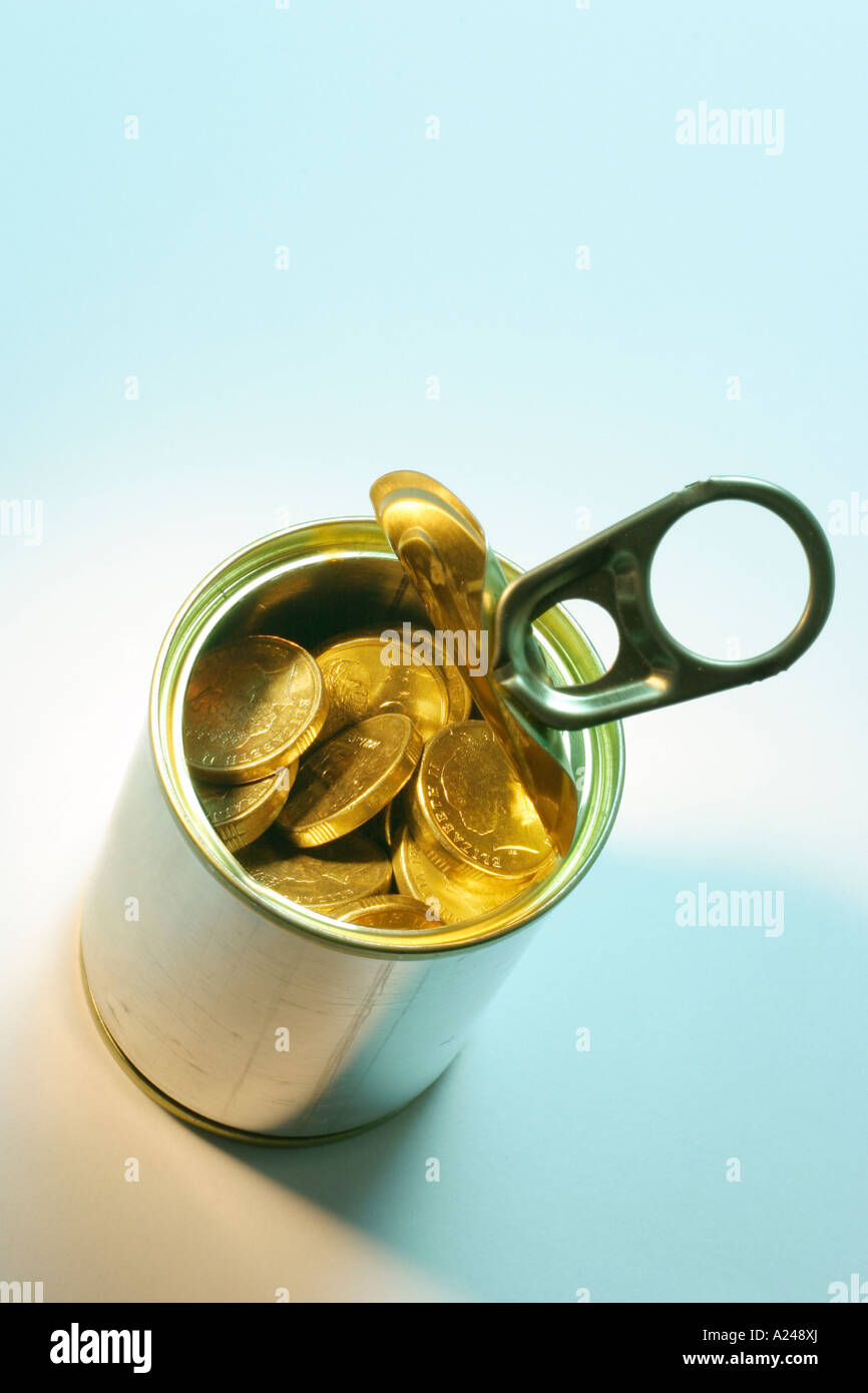 Coins in Tin Can Stock Photo - Alamy