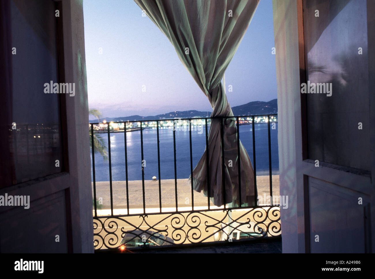 Europe city holiday window night escapism comfortable hi-res stock ...