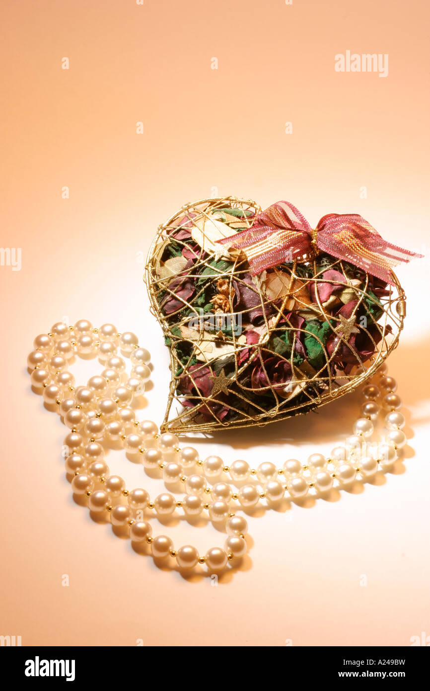 Potpourri and Pearl Necklace Stock Photo - Alamy