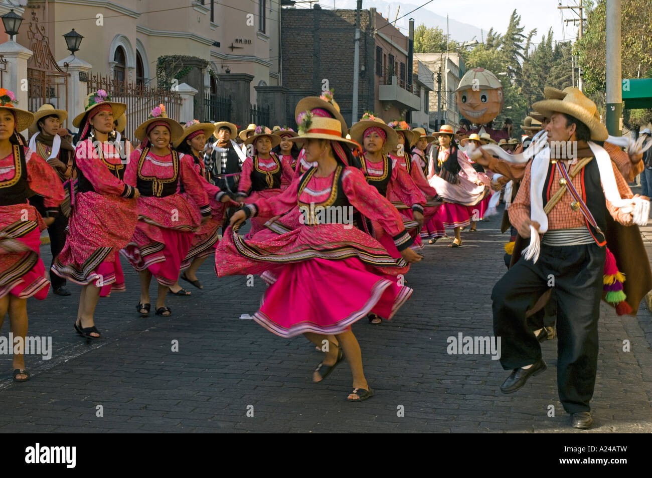 Participents at one of the many street festivals held in Peruvian towns ...
