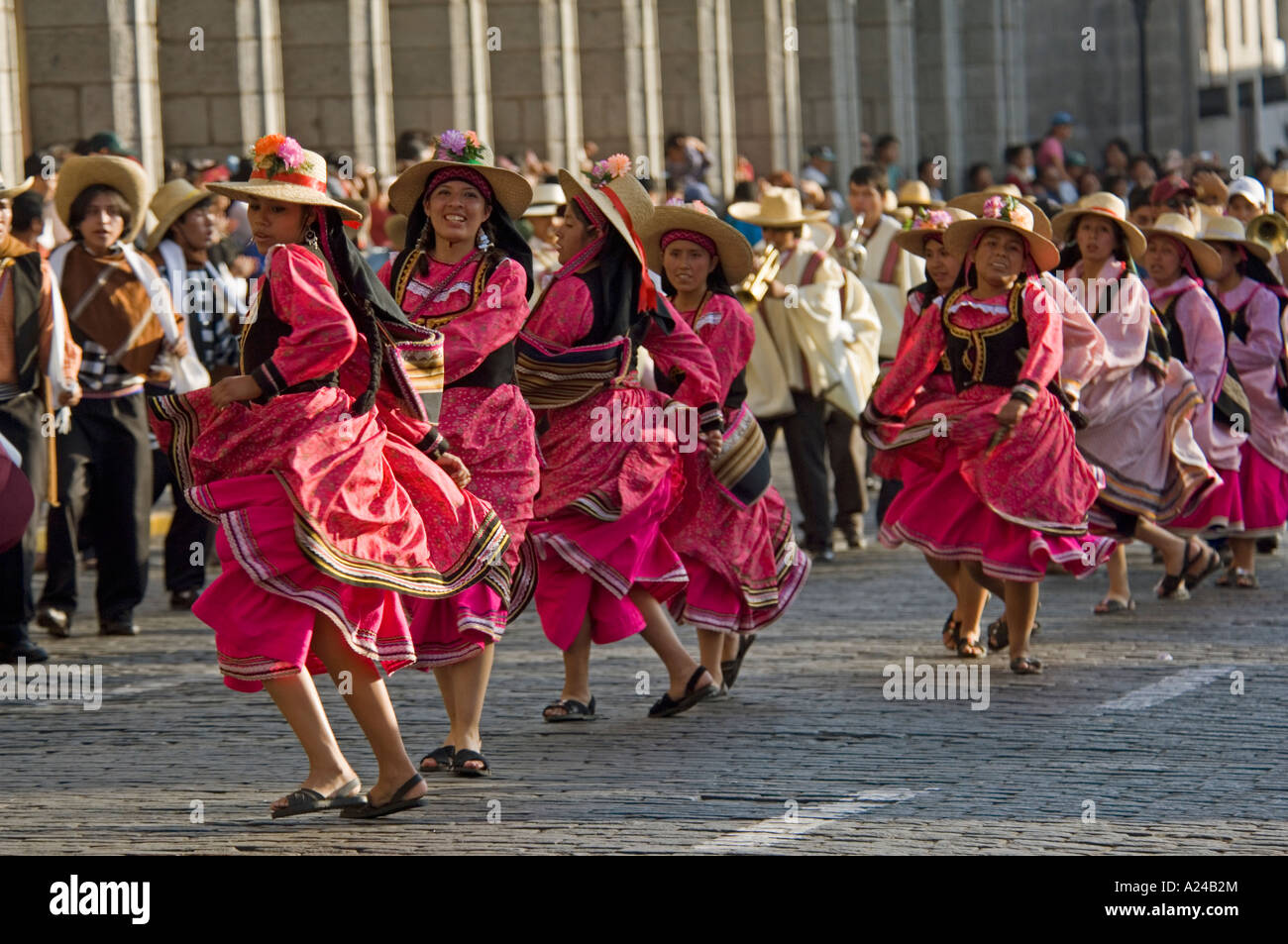 Participents at one of the many street festivals held in Peruvian towns ...