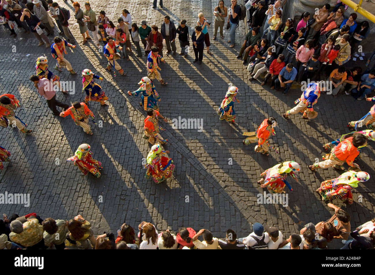 Participents at one of the many street festivals held in Peruvian towns ...