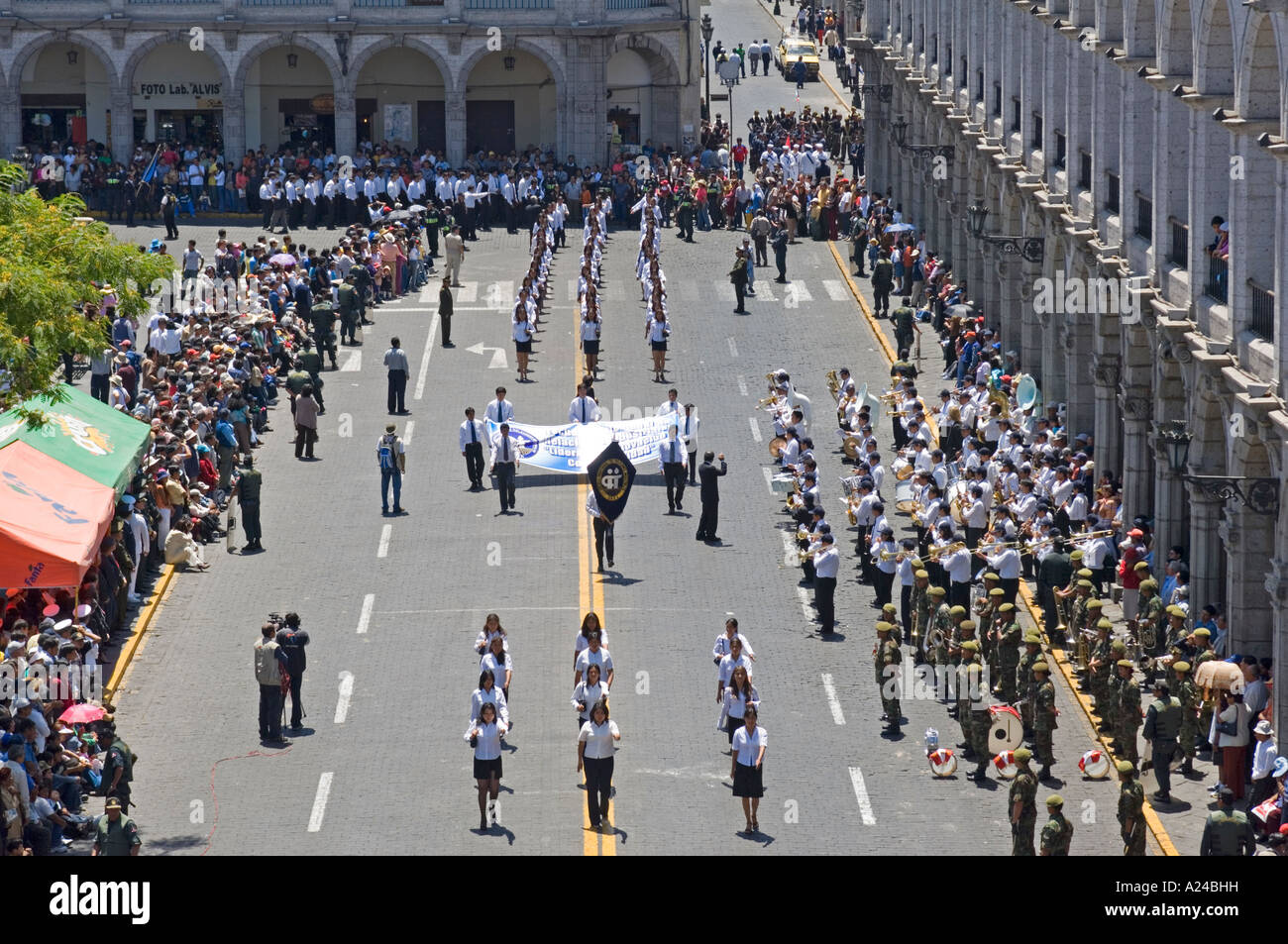 One of the many street parades held in Peruvian towns, villages and ...