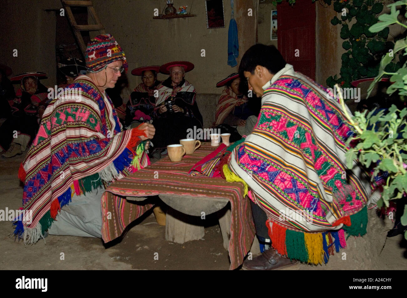 A tourist dressed in traditional Peruvian clothes takes part in the ...