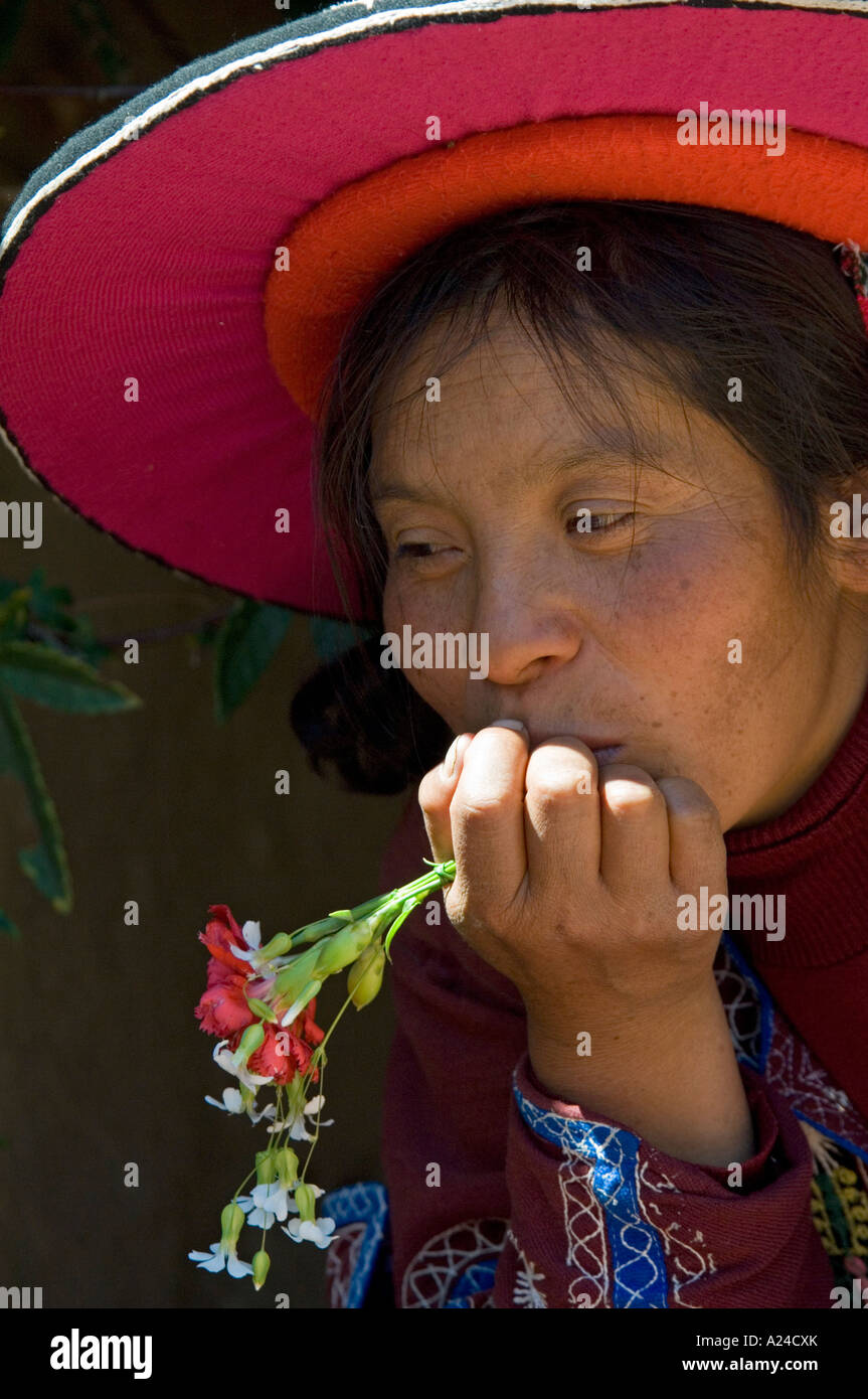 A head and shoulder portrait of a smiling local Hispanic Peruvian woman ...