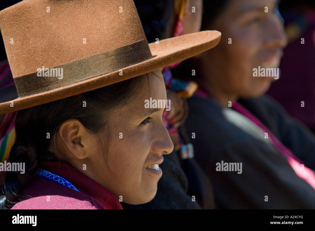 A head and shoulder portrait of a smiling local Hispanic Peruvian woman ...