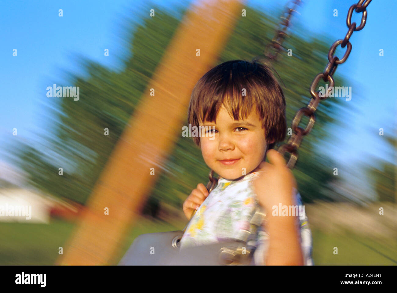 Children swing blur motion hi-res stock photography and images - Alamy