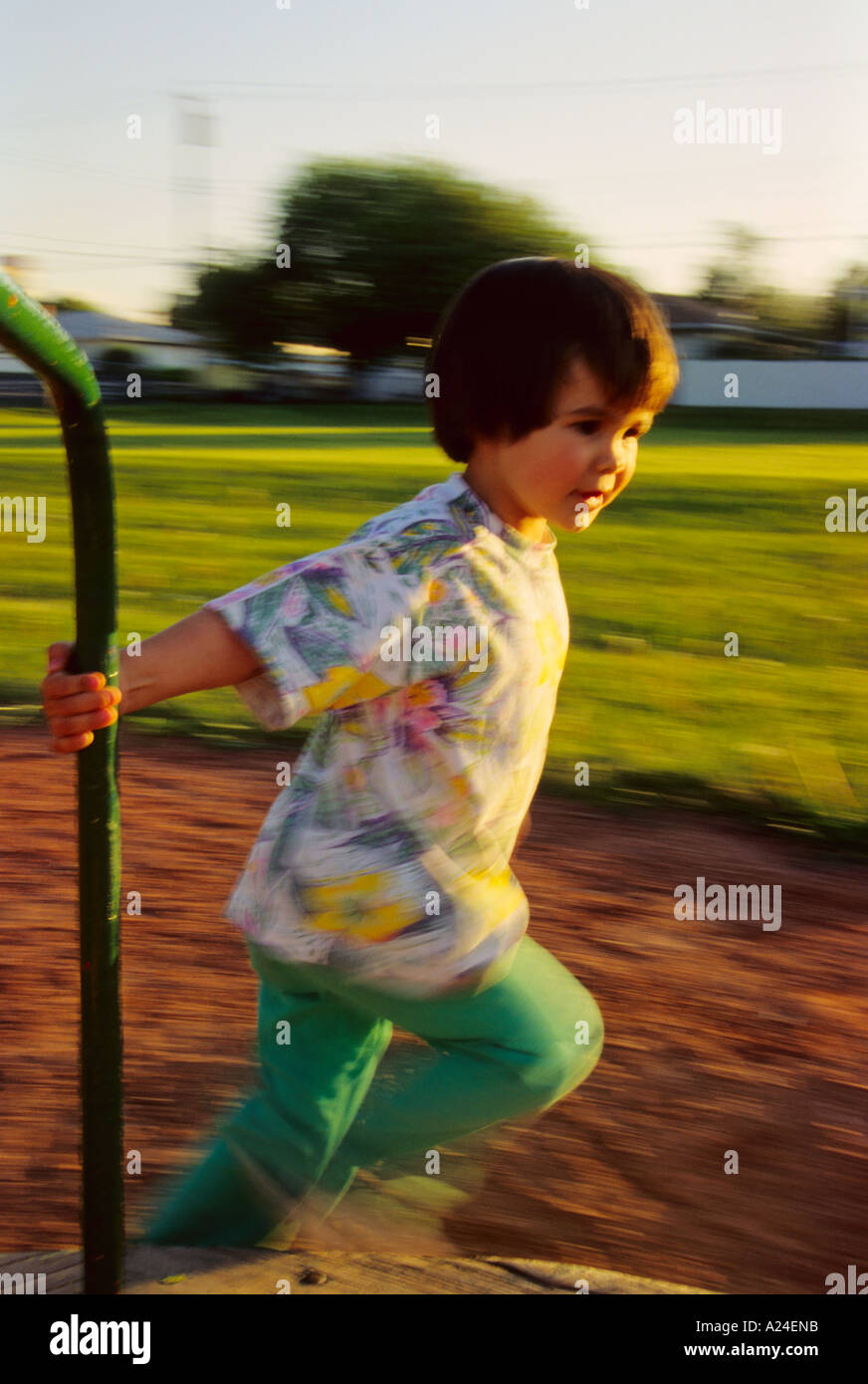 child on playground equipment Stock Photo - Alamy