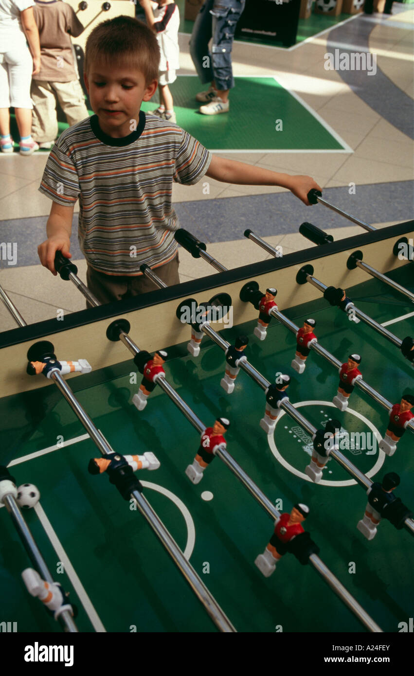Playing table football Stock Photo - Alamy