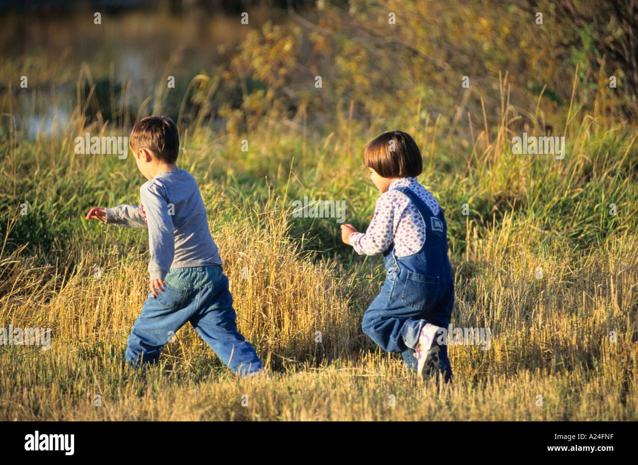 Children playing follow leader hi-res stock photography and images - Alamy