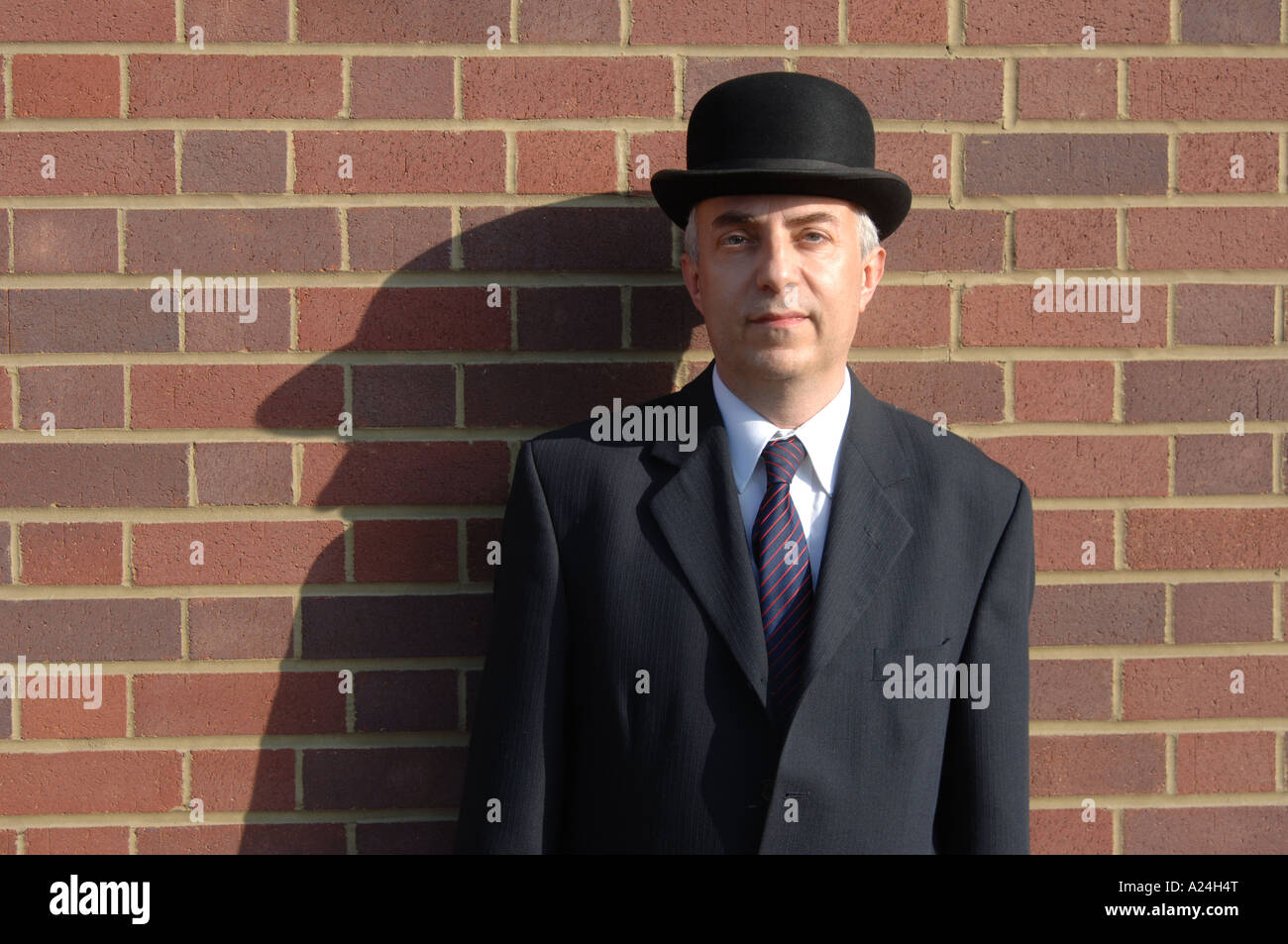 City gent. Traditional British businessman in bowler hat and suit Stock ...