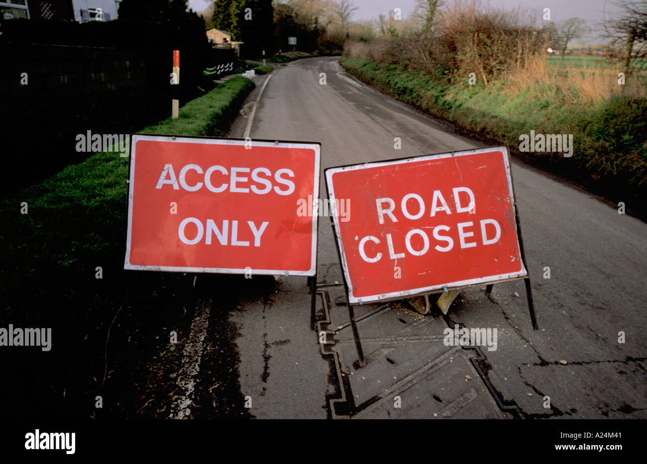 Access only road closed red signs road works up restricted no entry ...