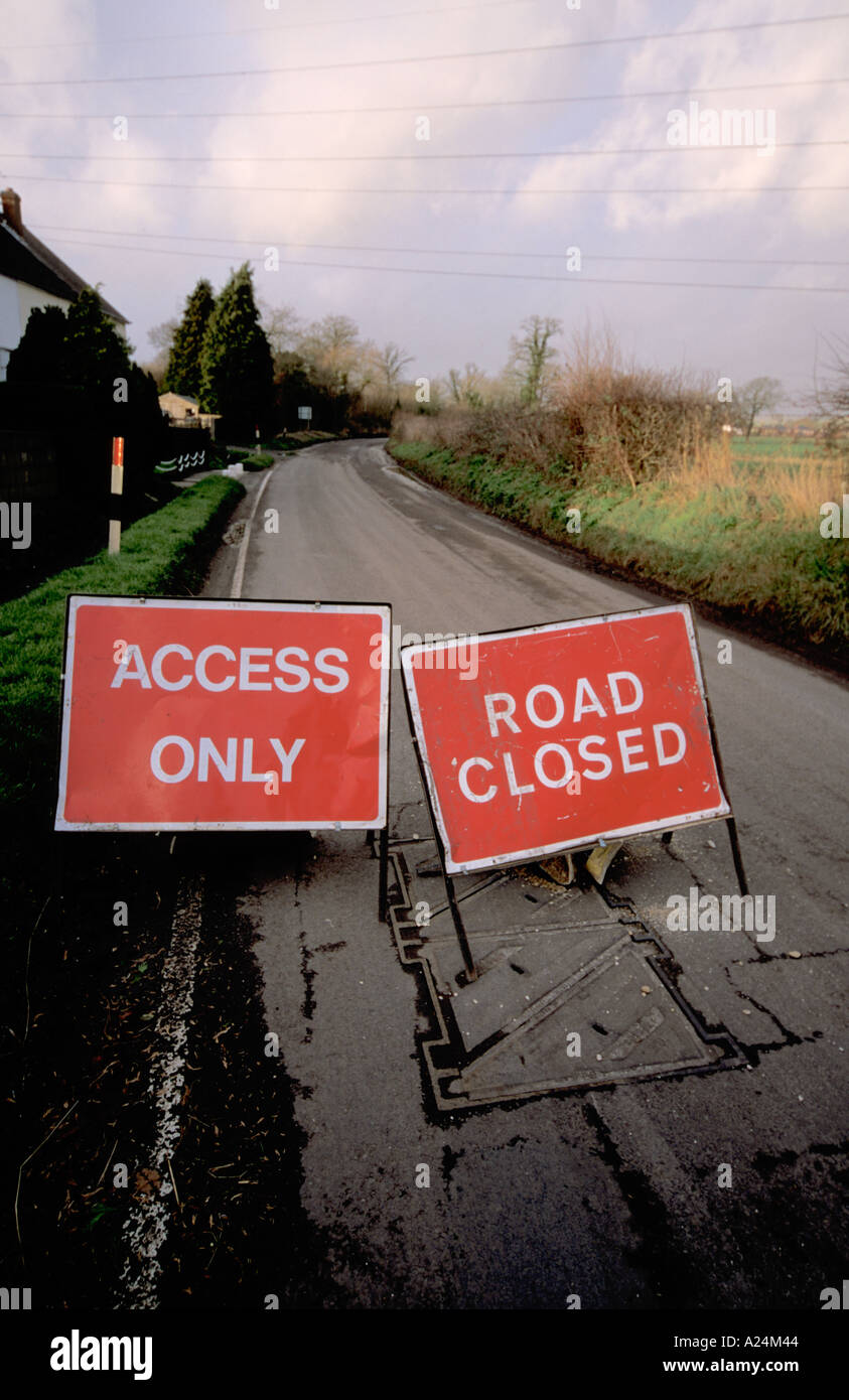 Access only road closed red signs road works up restricted no entry ...