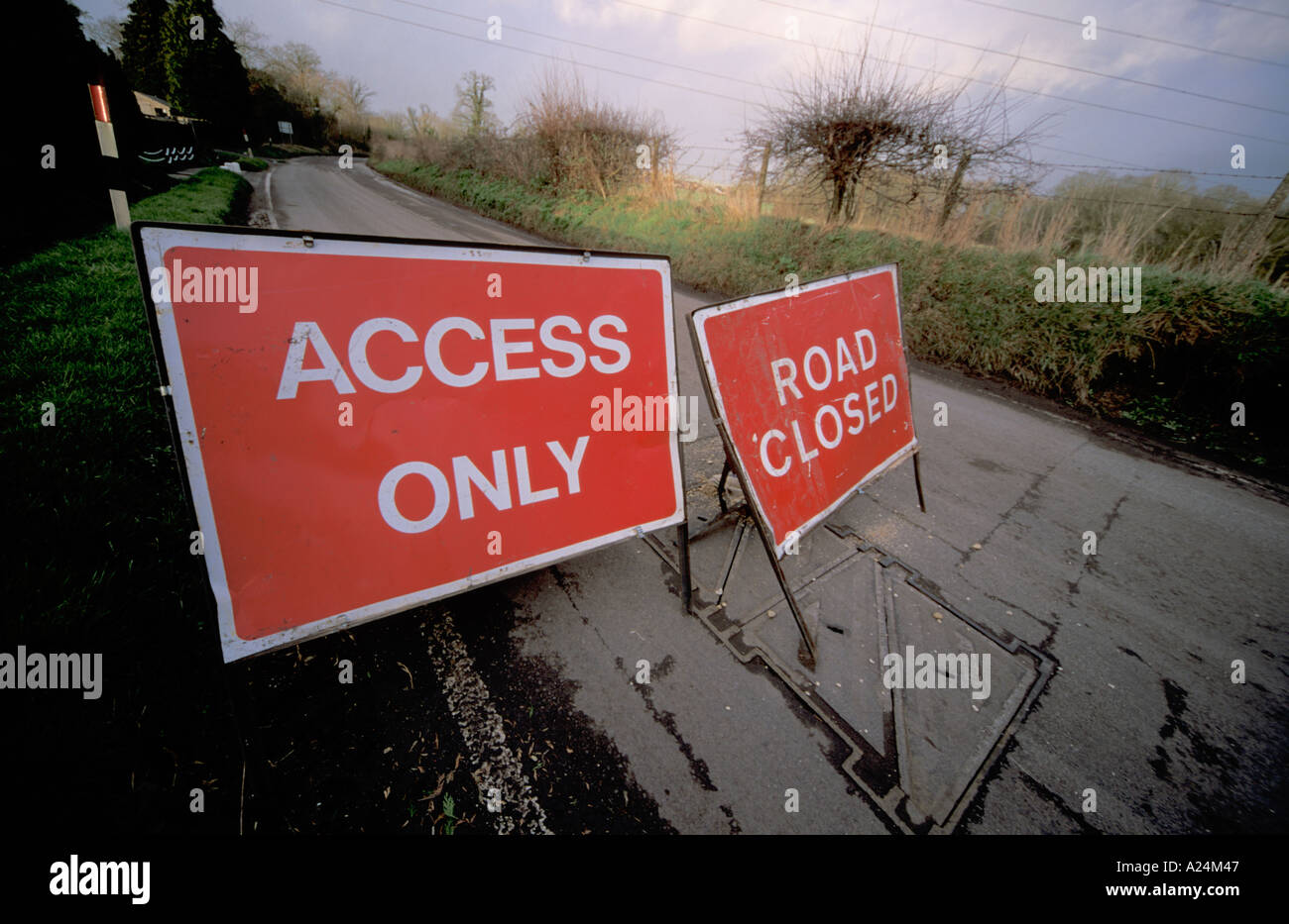 Access only road closed red signs road works up restricted no entry ...
