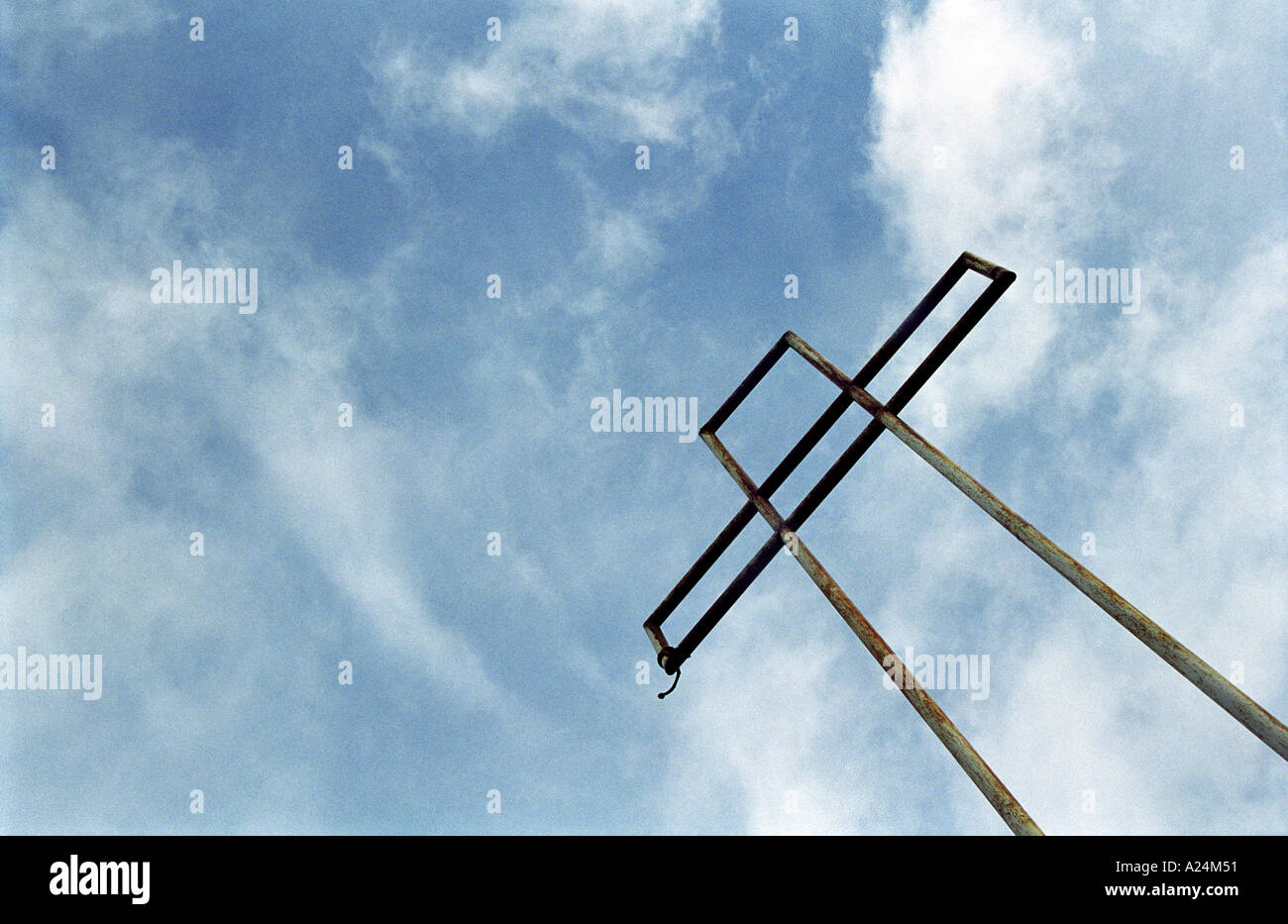Scaffold poles formed into a cross Stock Photo - Alamy