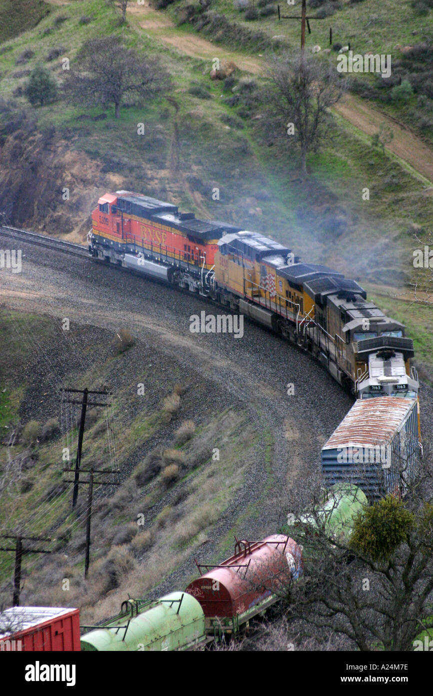 Freight Train Heads Uphill at Tehachapi Loop California USA Stock Photo - Alamy
