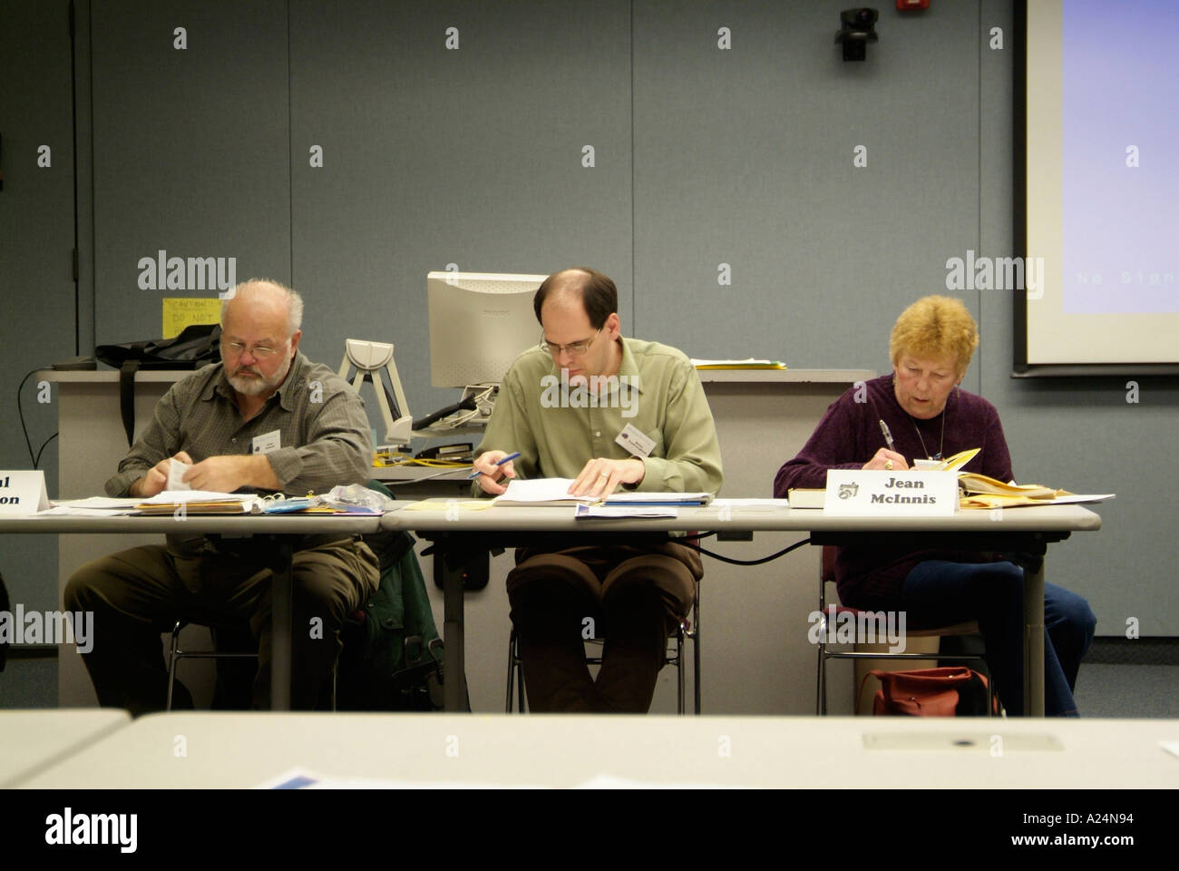 Adult computer class training is conducted during a business meeting ...