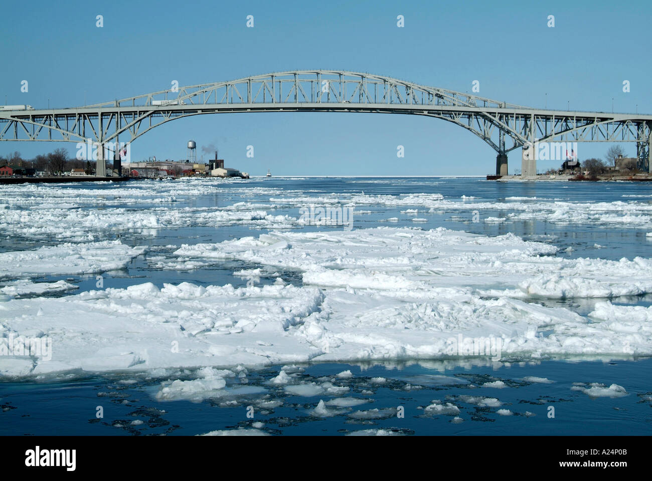 Ice flows under the Blue Water International Bridge at Port Huron ...
