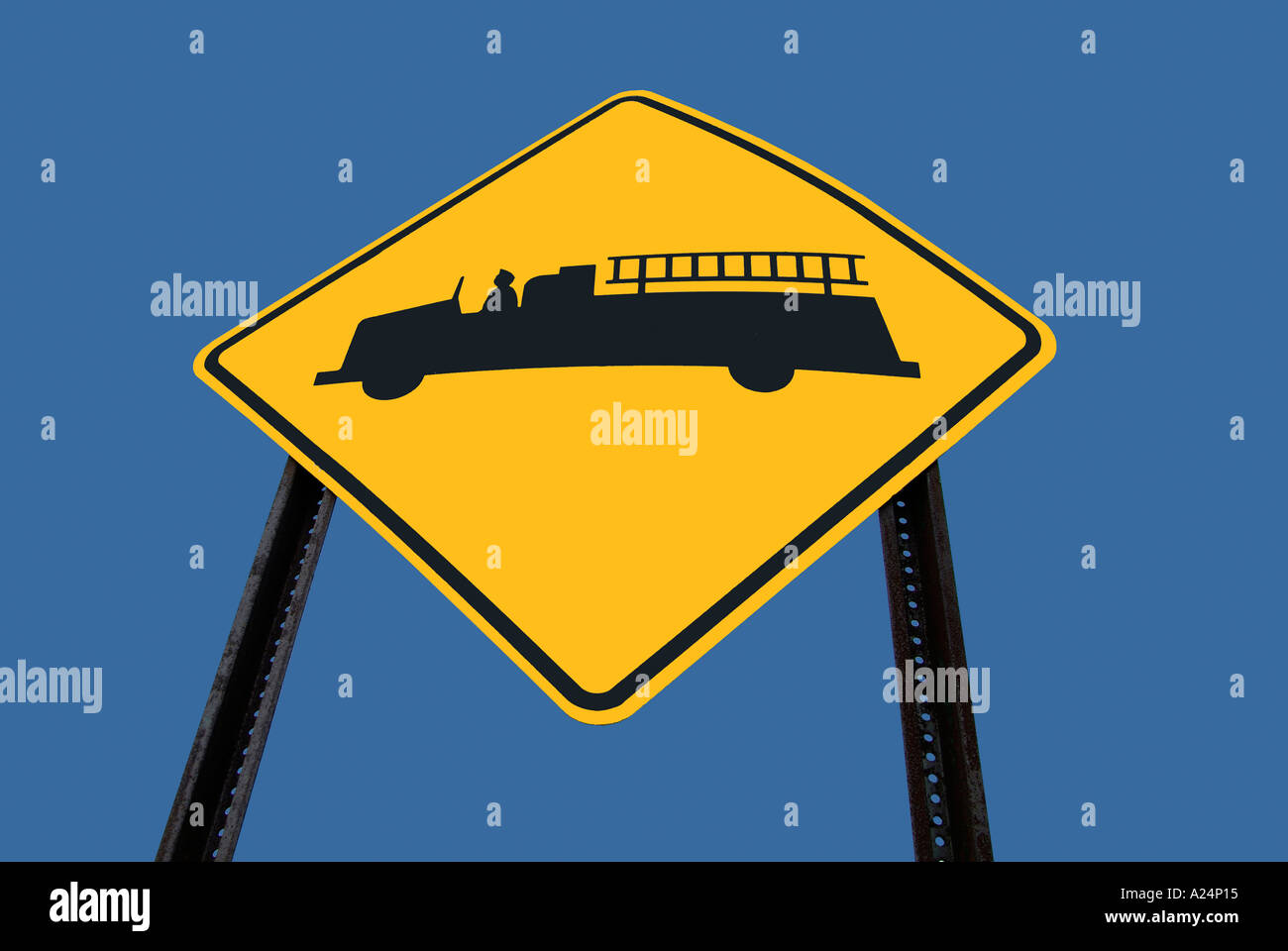 Street sign with fire truck warning indicating a fire station nearby ...