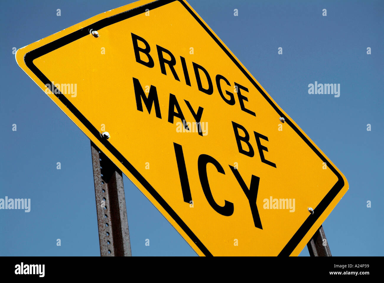 Bridge may be icy warning street sign Stock Photo - Alamy